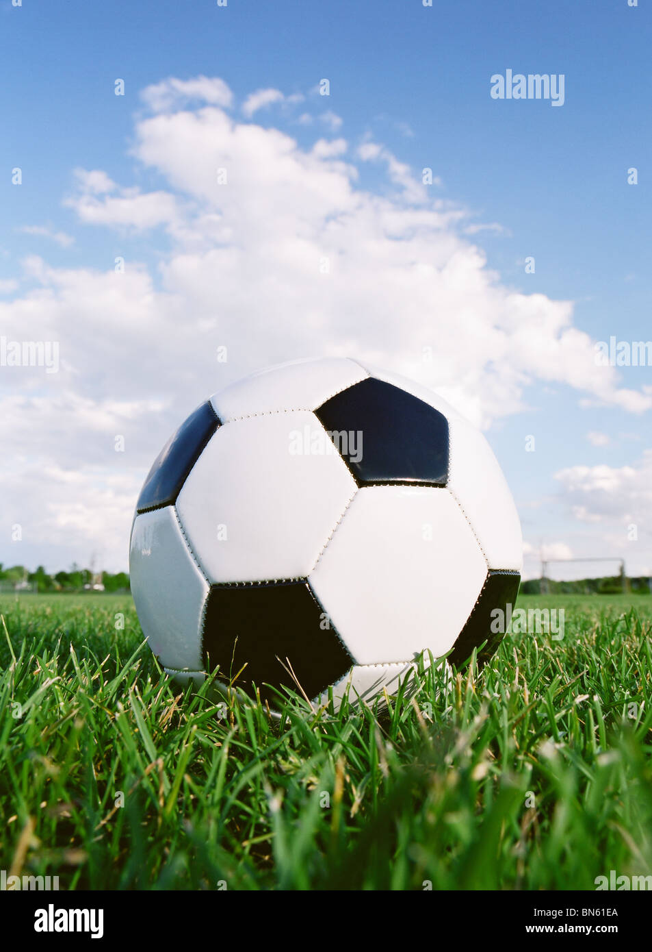Football in the goal net Stock Photo - Alamy