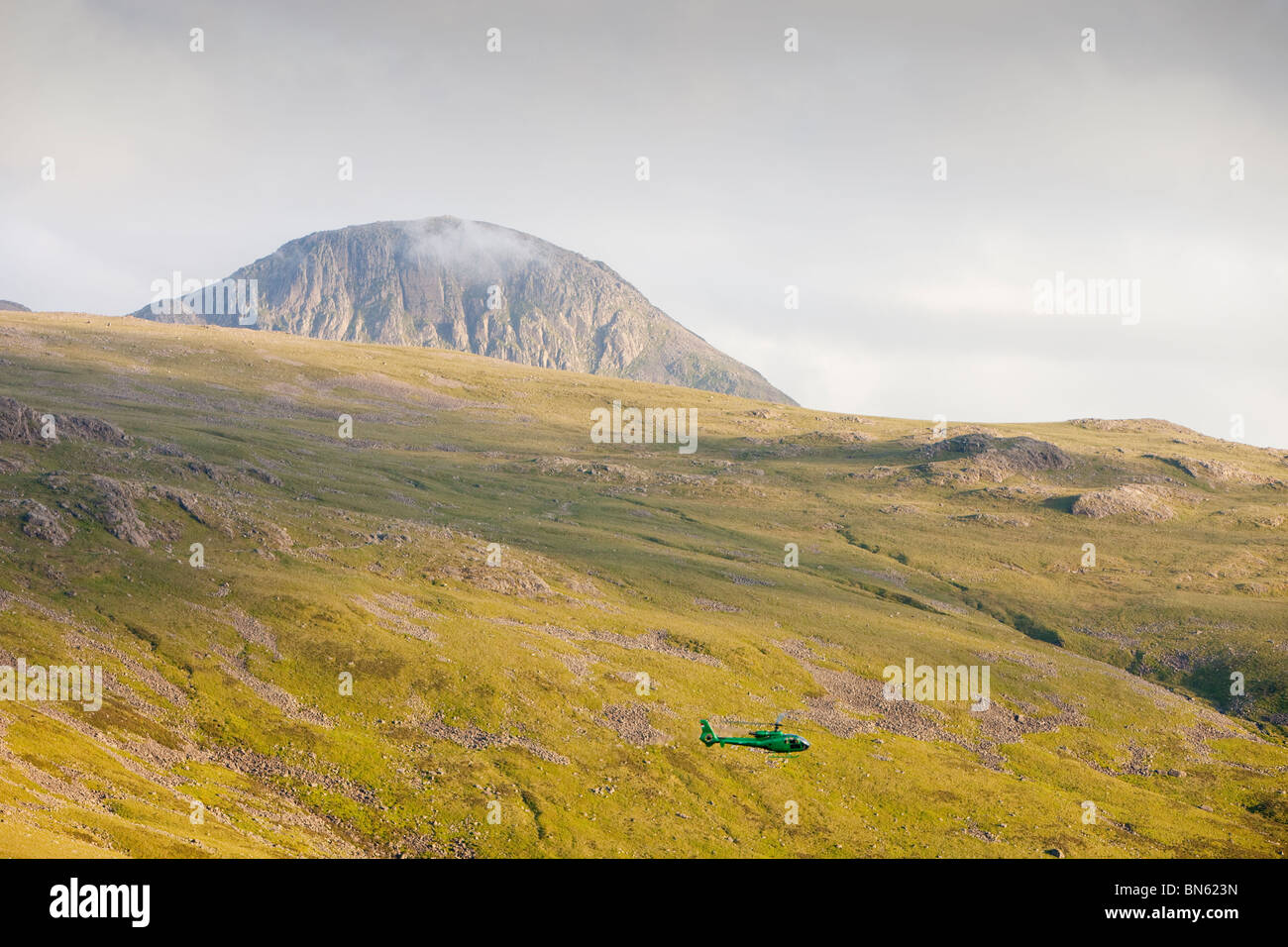 Mark Weir, the owner of Honister Slate Mine flies in his helicopter ...