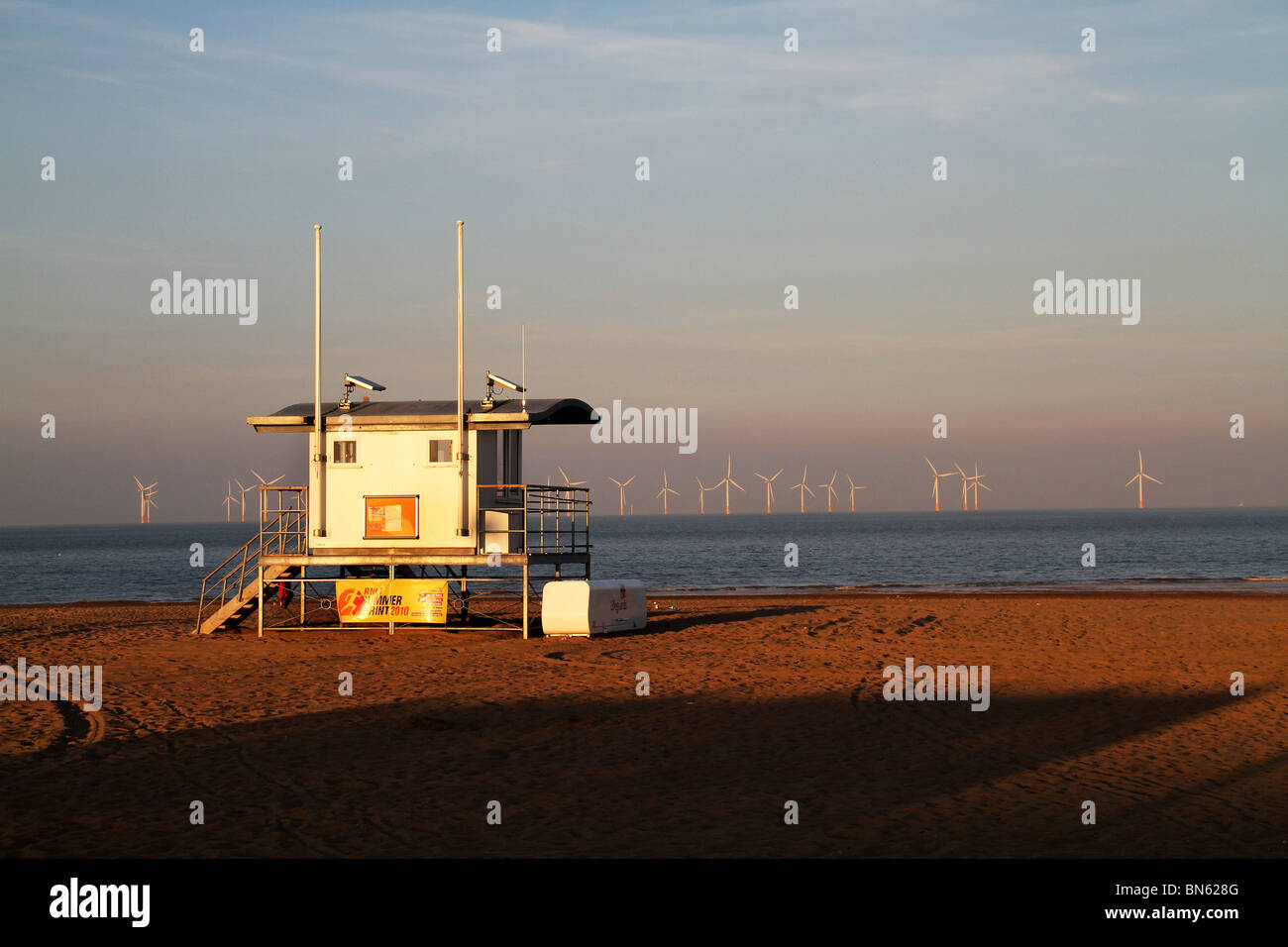 Beach guard safety hut with windfarm offshore at Skegness Stock Photo ...