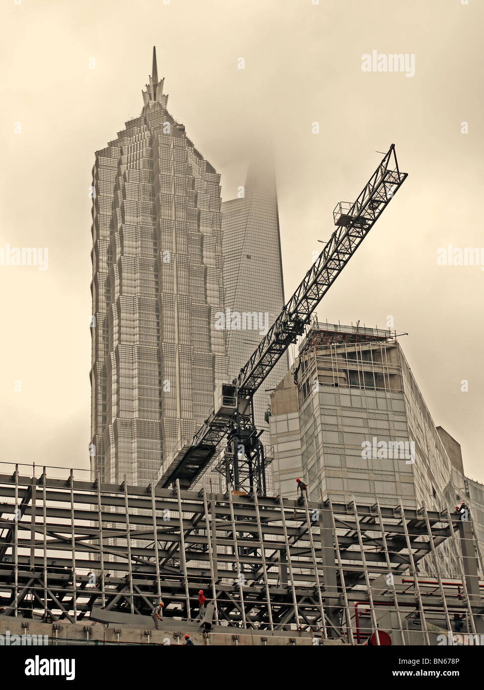New skyscraper construction in Shanghai, China - in red and sepia color ...