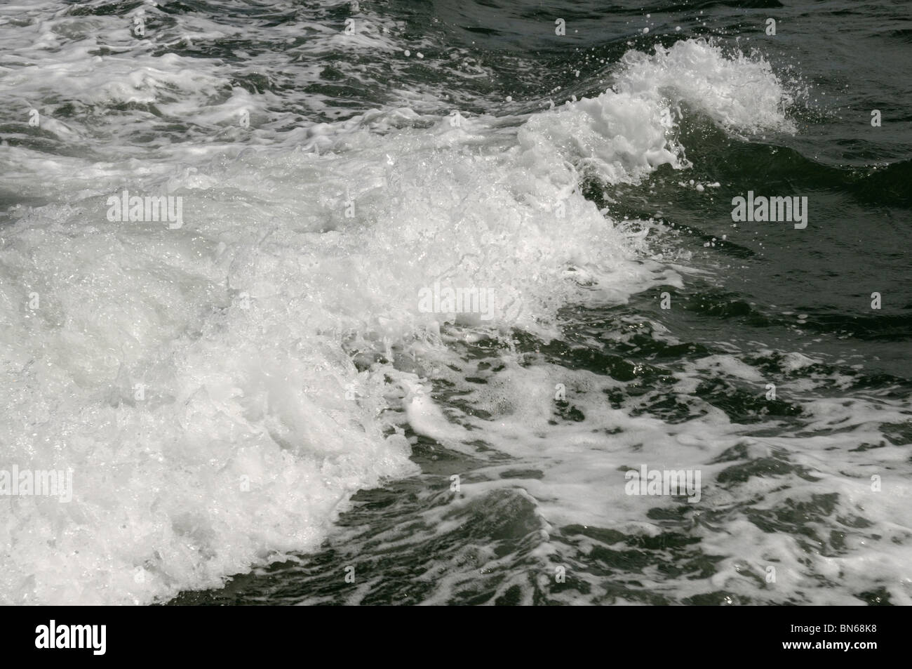 Sea water splash Stock Photo - Alamy