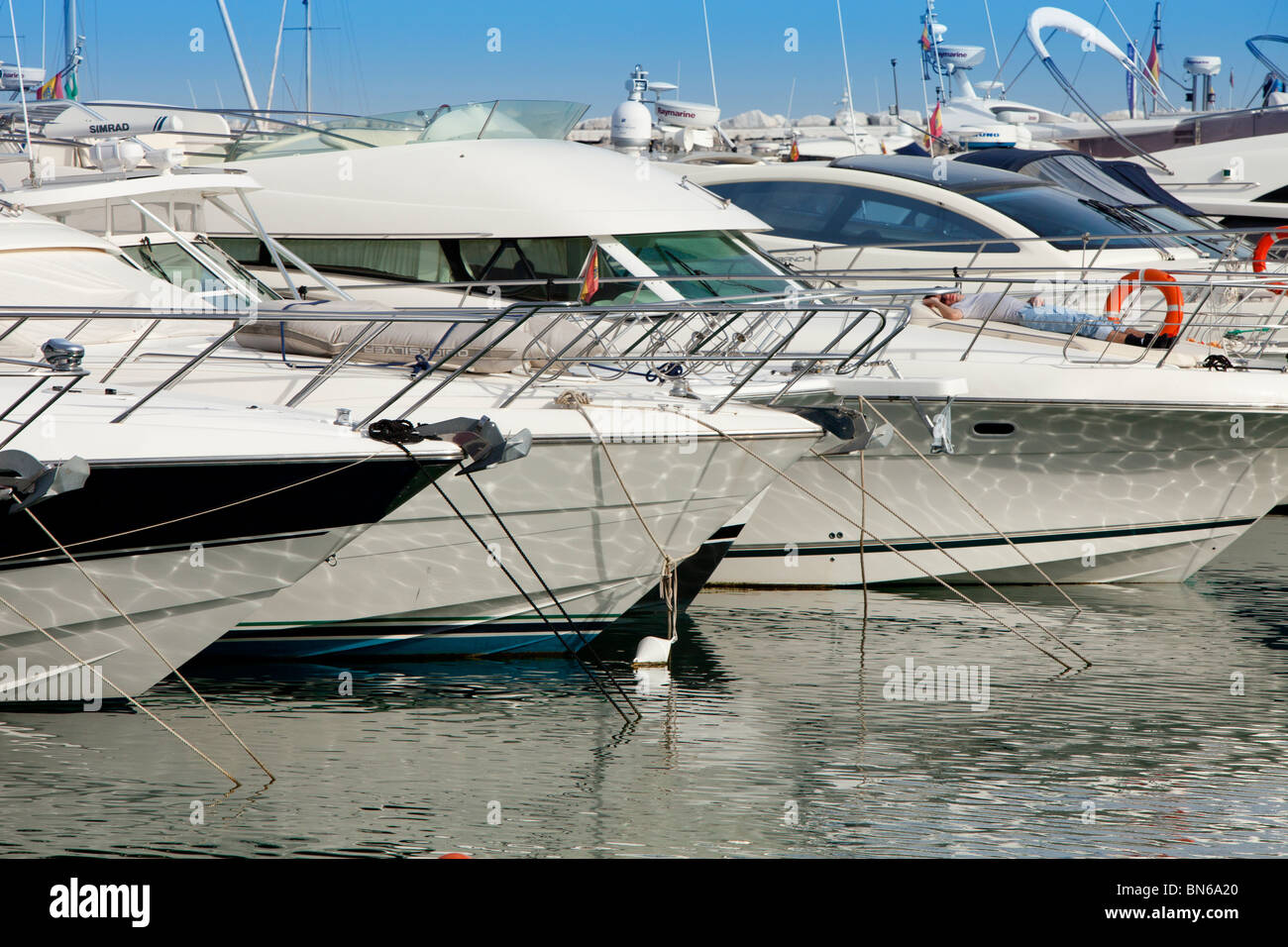 Luxury yachts at anchor in the sun Stock Photo - Alamy