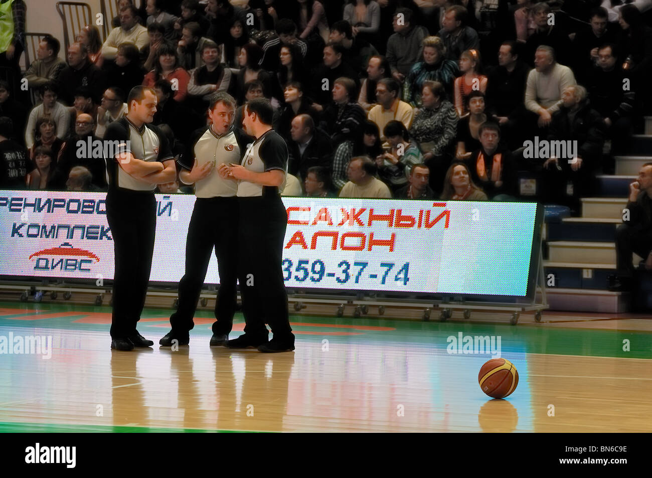 Referees joking. The ball Stock Photo - Alamy