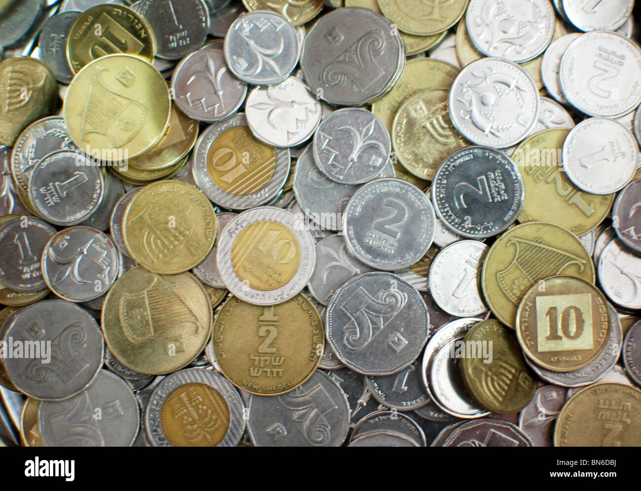 a pile of different Israeli coins Stock Photo - Alamy