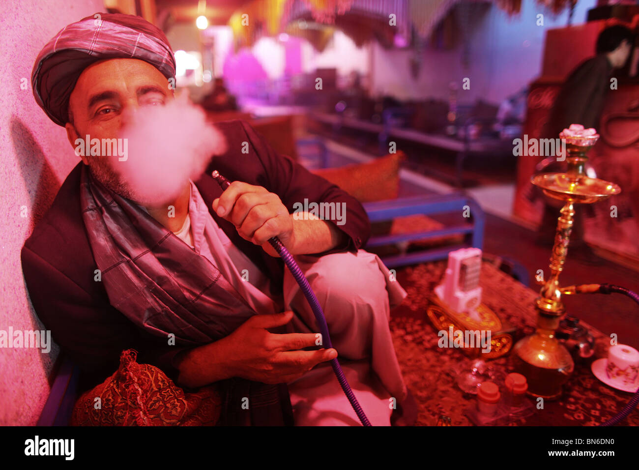 smoking a waterpipe in a bar in kabul, Afghanistan Stock Photo - Alamy