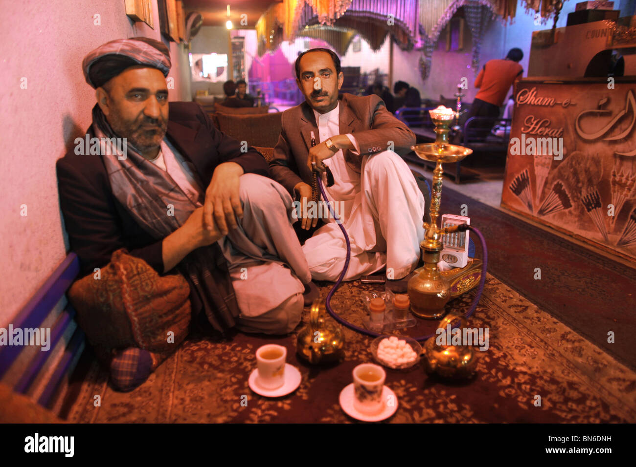 smoking a waterpipe in a bar in kabul, Afghanistan Stock Photo - Alamy