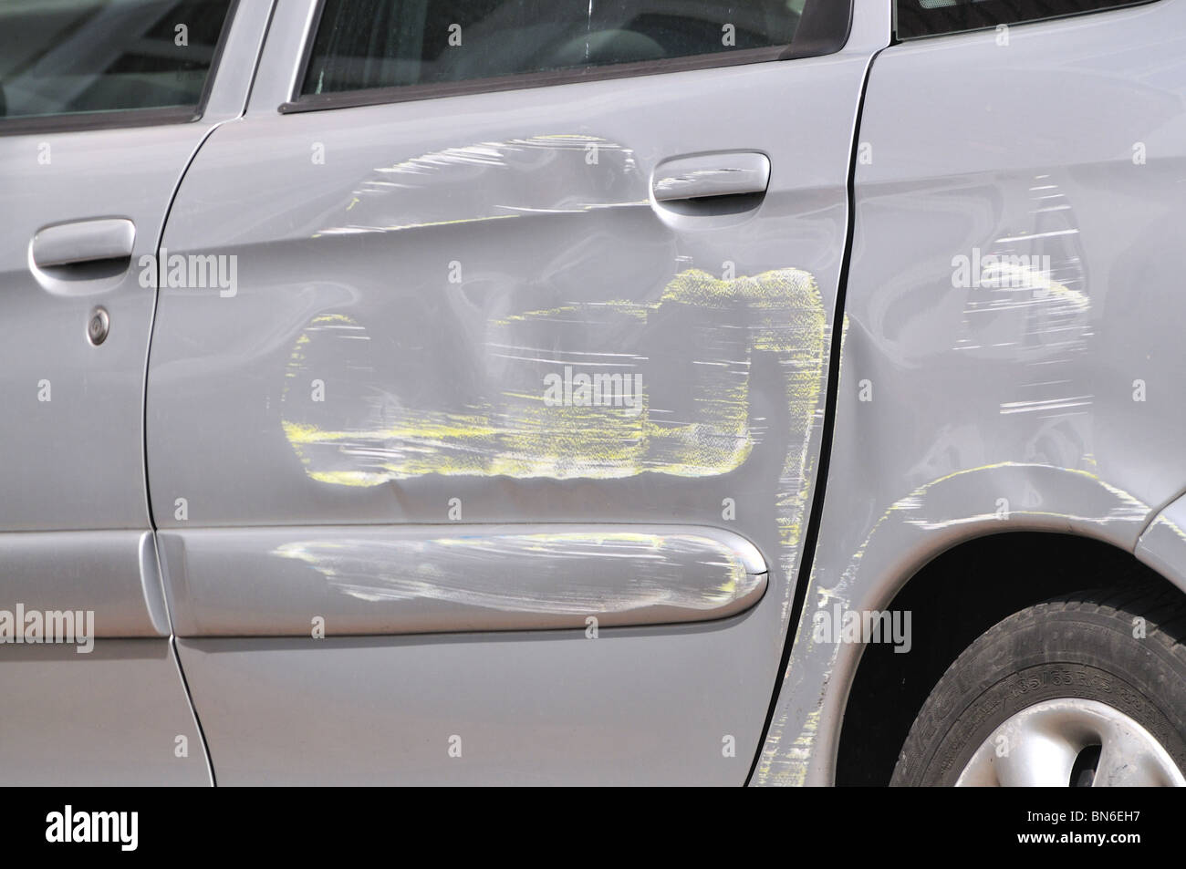 Car door showing scuffs ,damage Stock Photo - Alamy