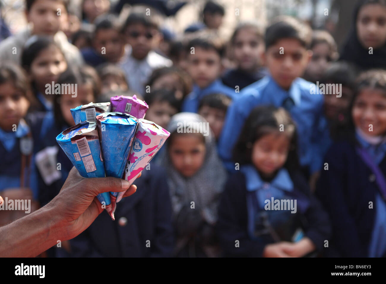 Children yearning for icecream in Pakistan Stock Photo - Alamy