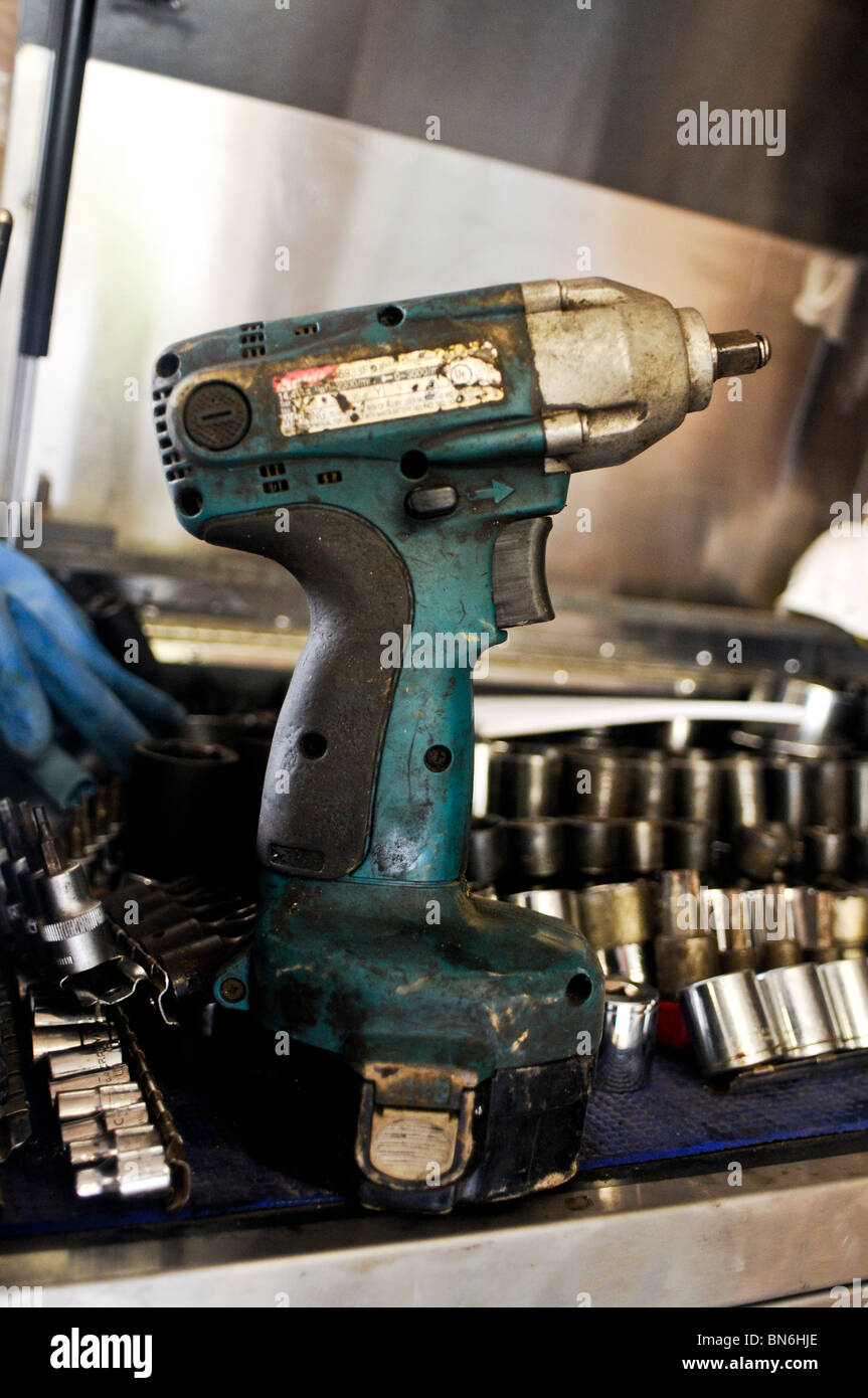 greasy tools on a workbench Stock Photo - Alamy