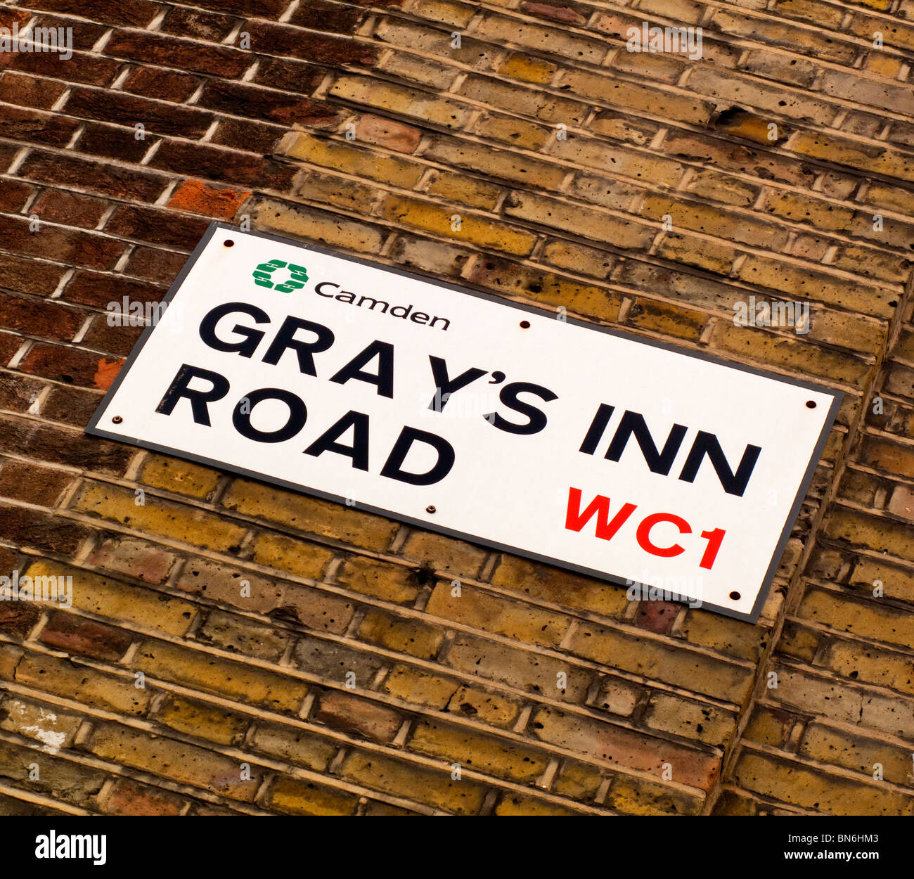 Gray's Inn Road WC1 street sign on a brick wall in King's Cross north ...