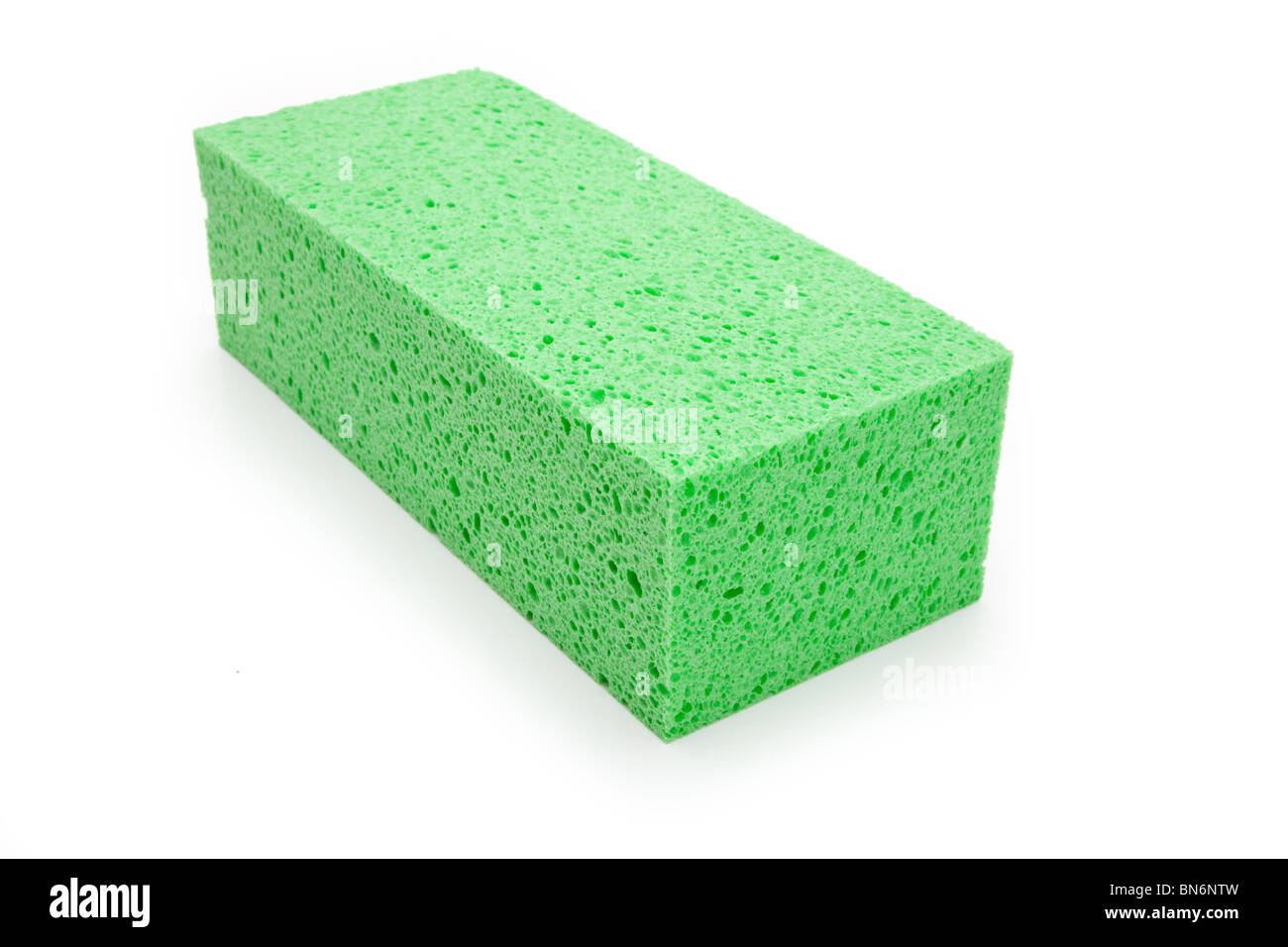 Green Sponge with white background Stock Photo - Alamy