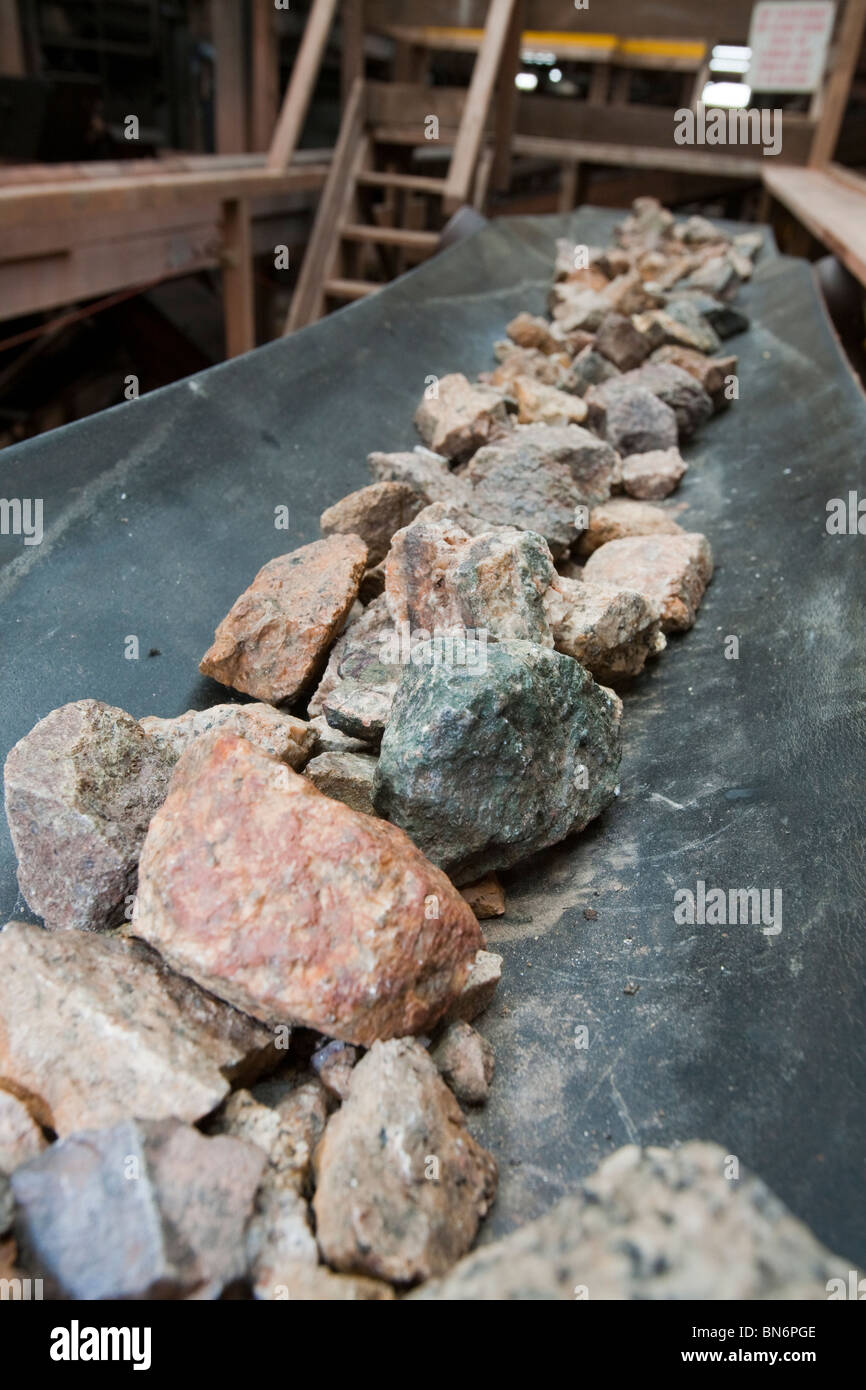 Tin ore bearing rock on a conveyor at Geevor mine in Cornwall, it ...