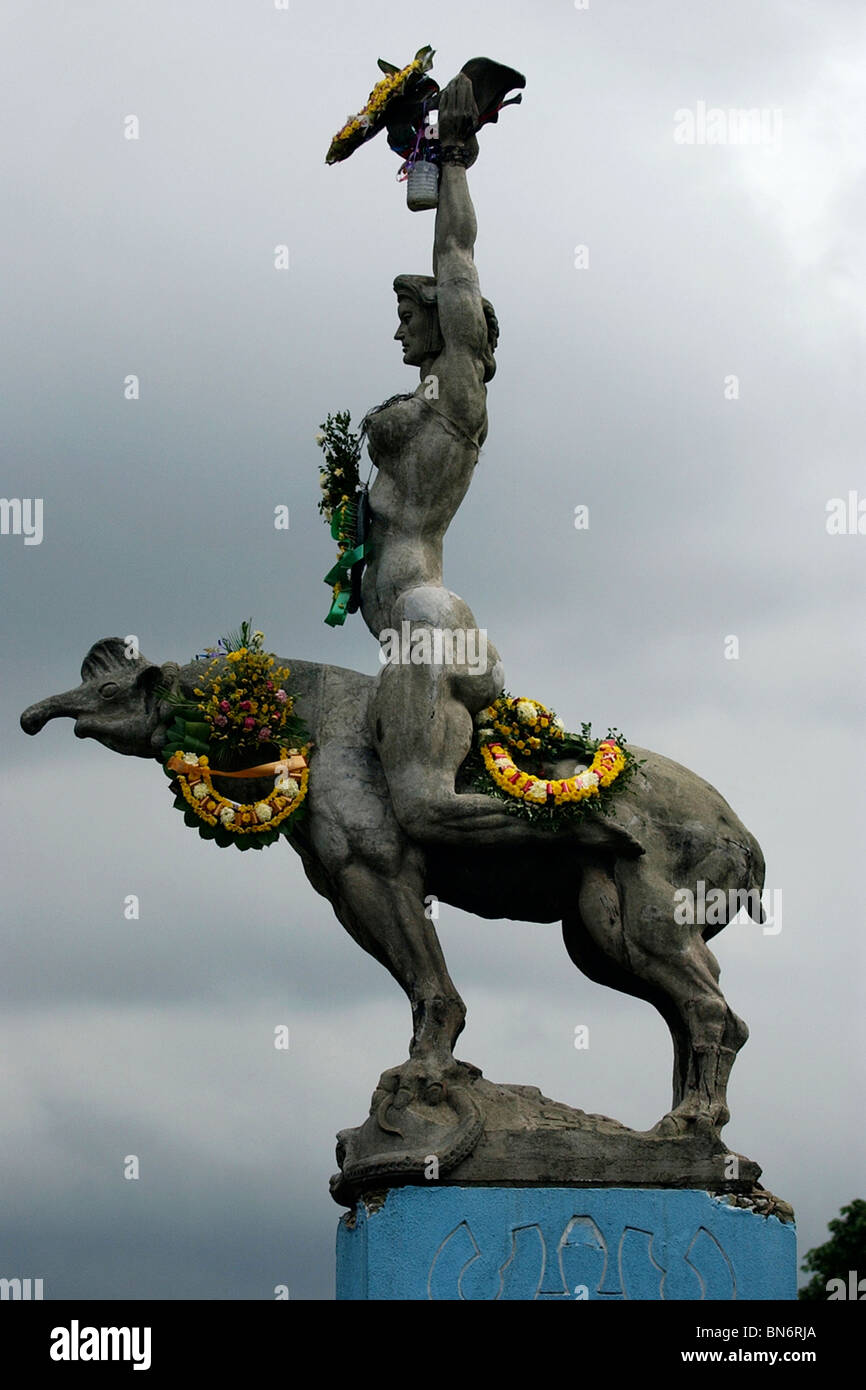 A statue of Venezuela's highest Santeria goddess Maria Lionza overlooks ...