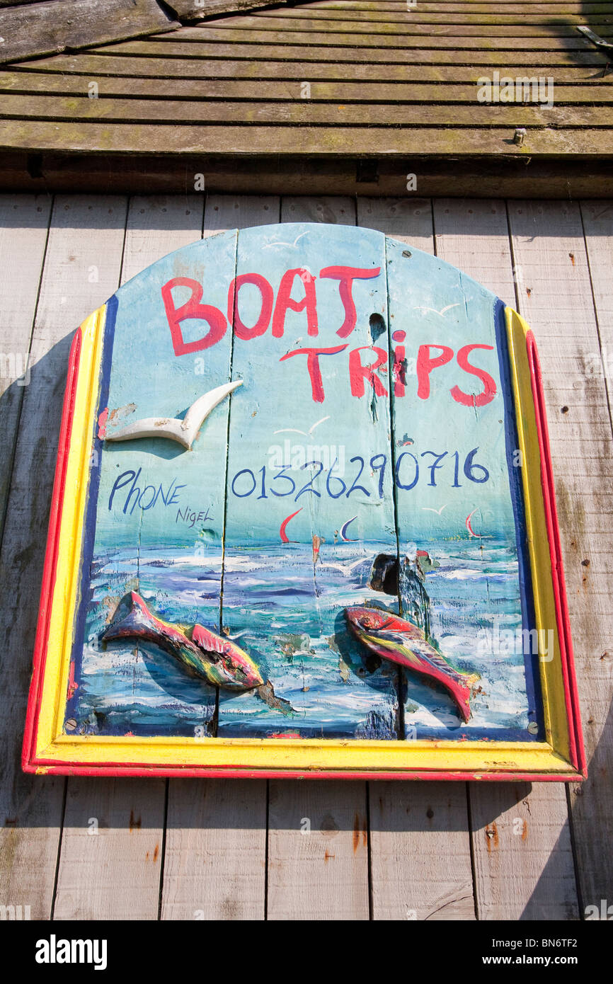 A sign advertising boat trips in Cadgwith, cpornwall, UK Stock Photo ...