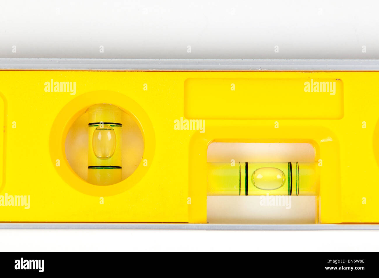 Yellow spirit level isolated on a white background Stock Photo - Alamy