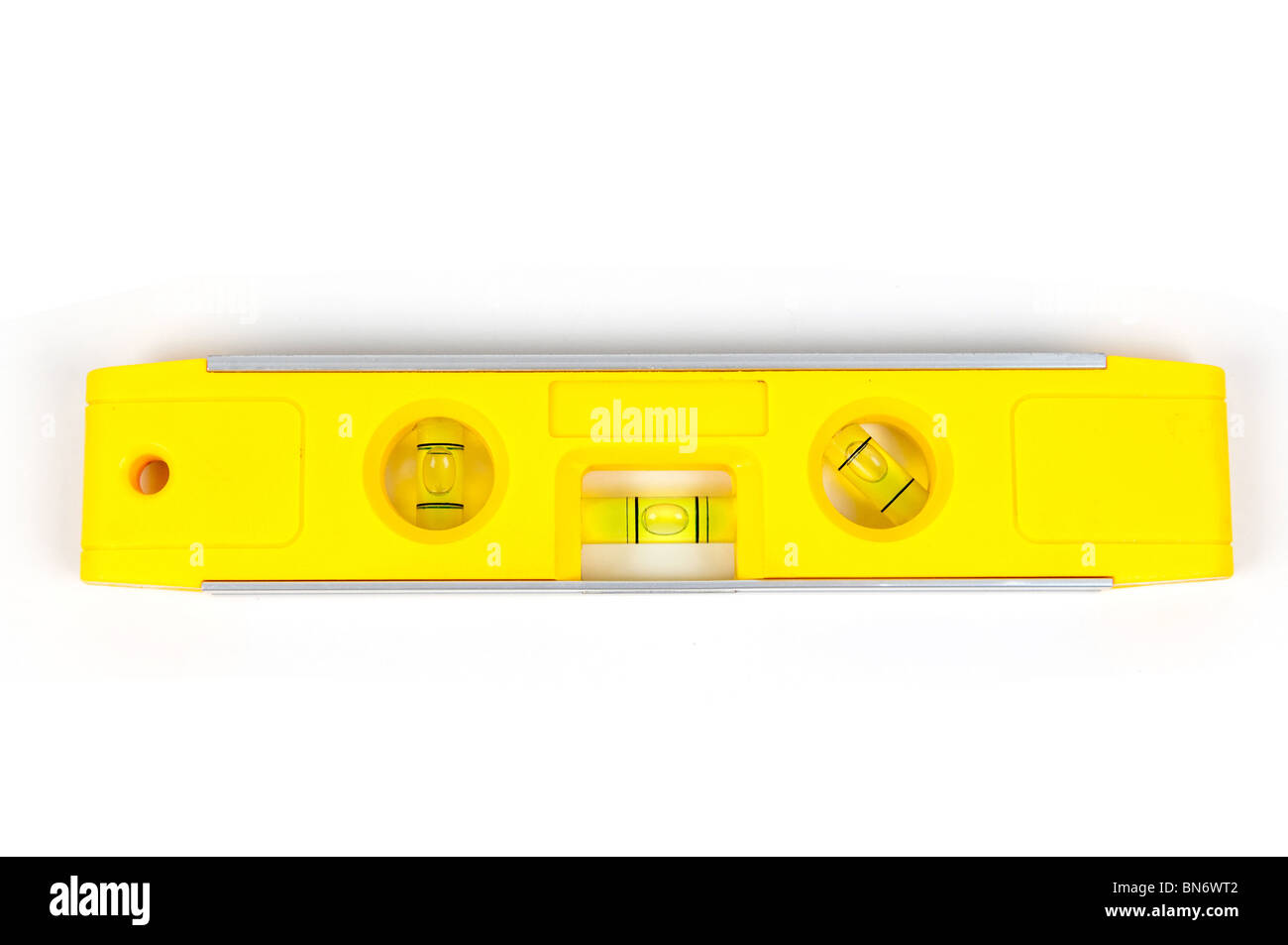 Yellow spirit level isolated on a white background Stock Photo - Alamy