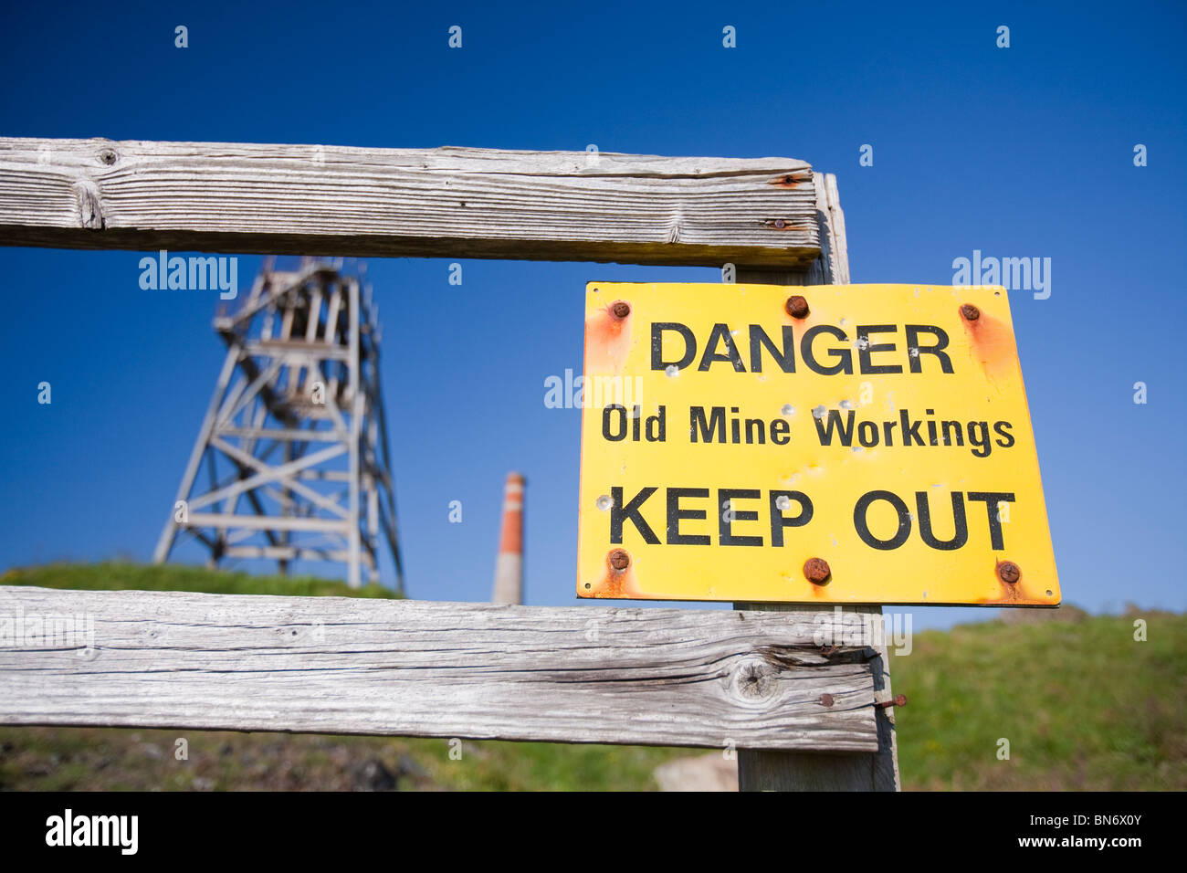 A warning sign at an area of old tin mines in Botallack, Cornwall, UK ...