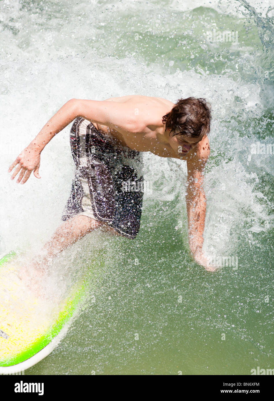 Surfer catches wave hi-res stock photography and images - Alamy