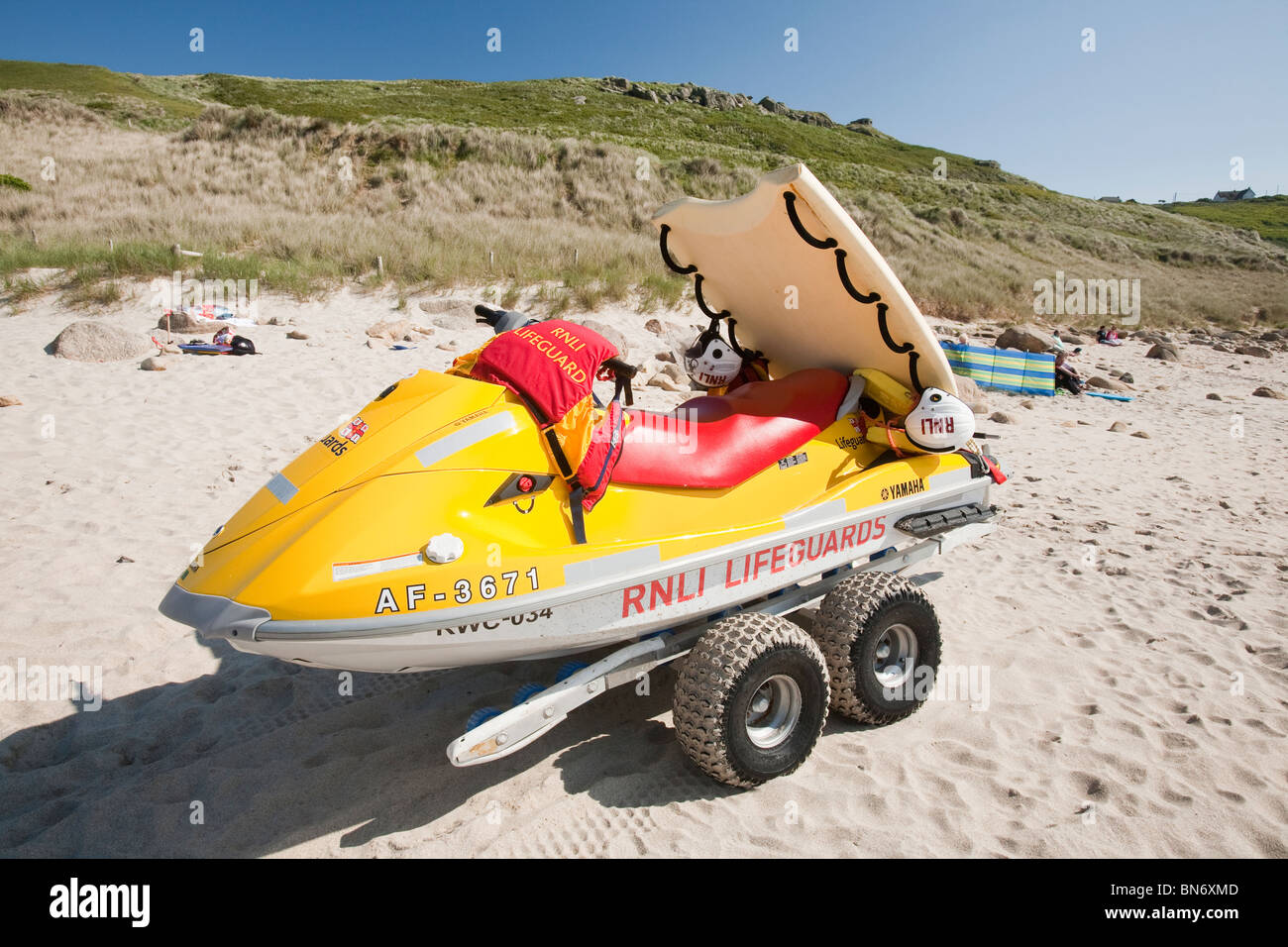 An RNLI jet ski on the beach at Sennen Cove, Cornwall, UK Stock Photo ...