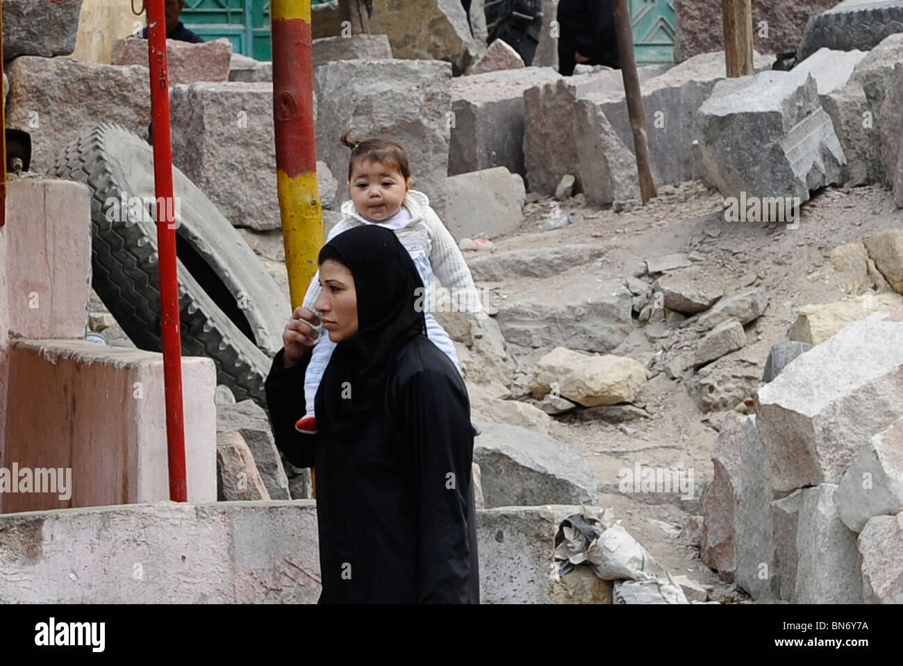 muslim egyptian lady with baby , souk goma (friday market), Southern ...