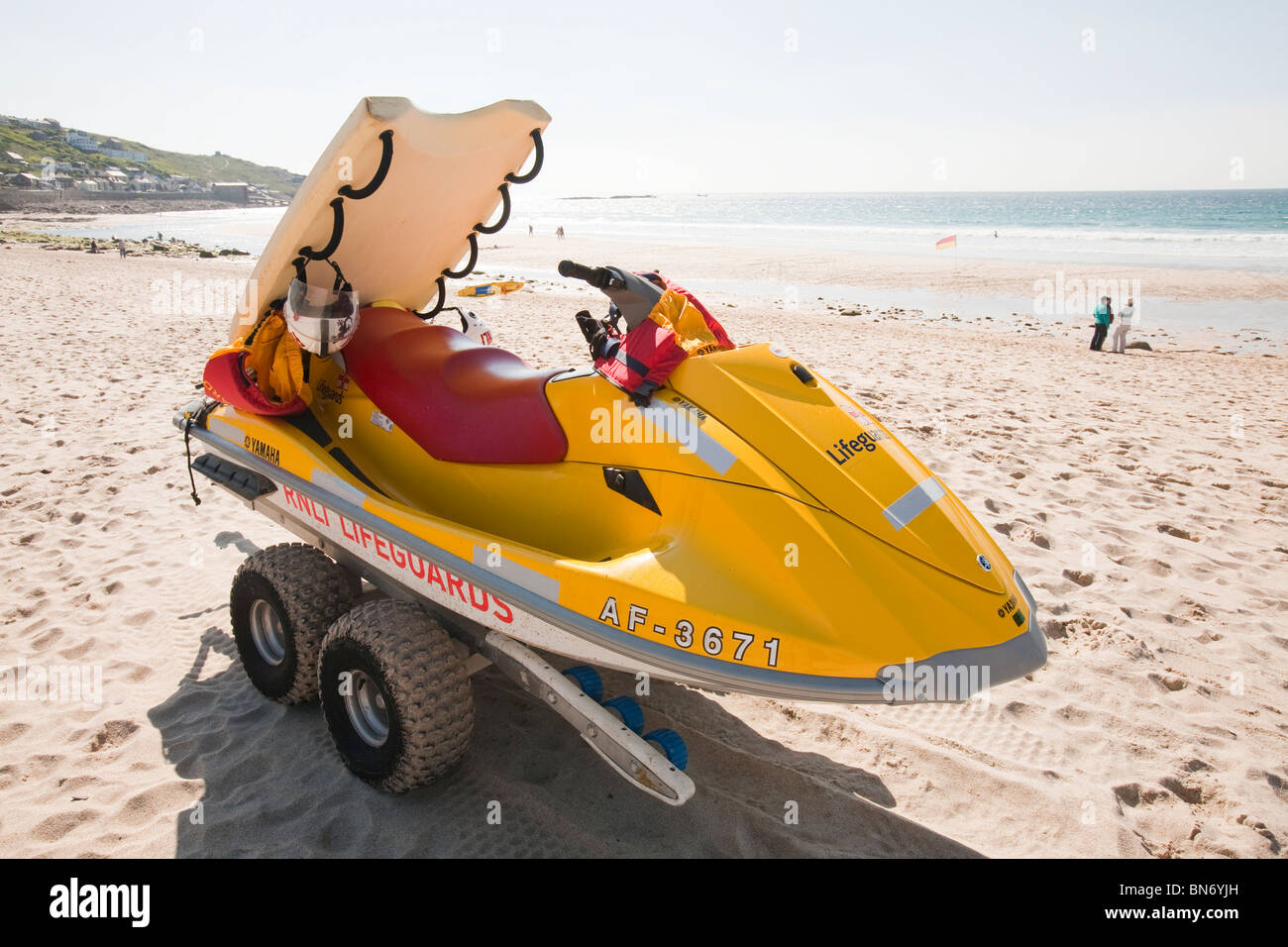 An RNLI jet ski on the beach at Sennen Cove, Cornwall, UK Stock Photo ...