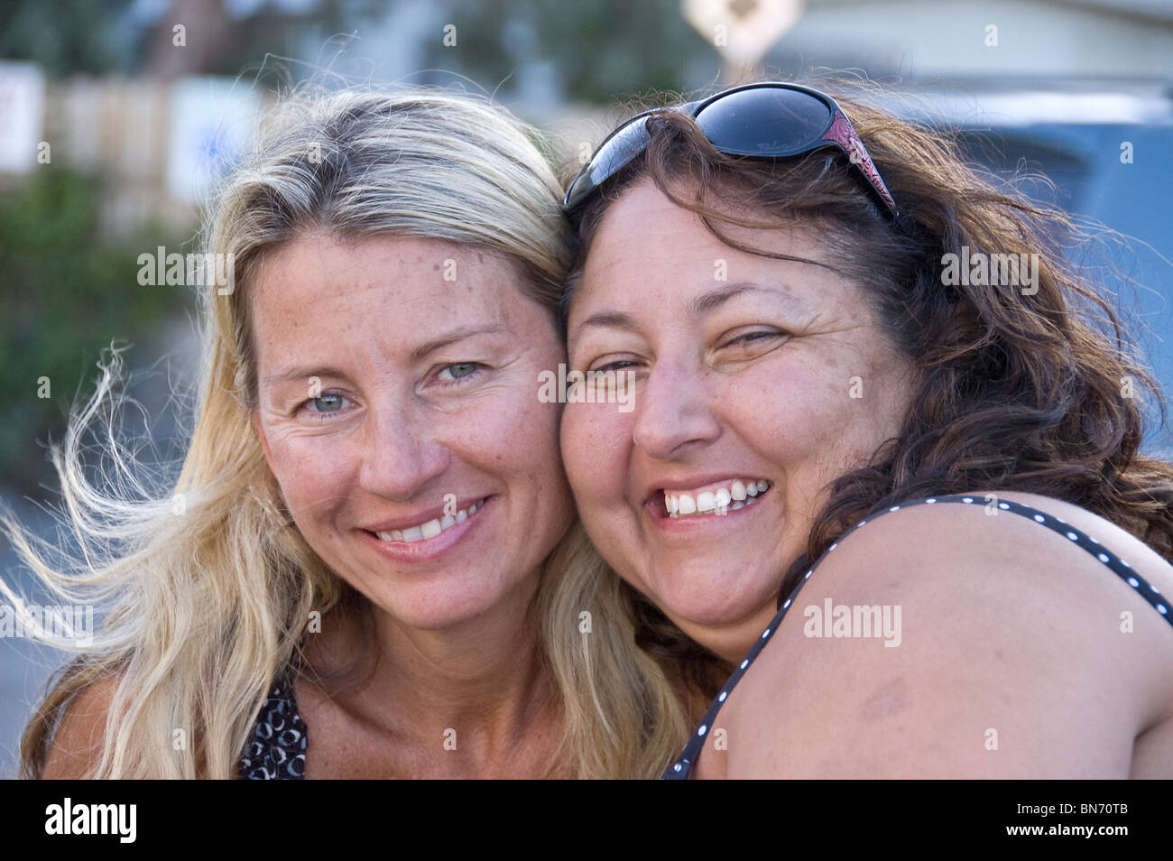Two close friends embracing Stock Photo - Alamy