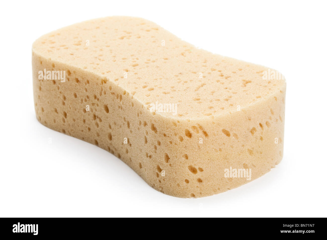 Yellow Sponge with white background Stock Photo - Alamy