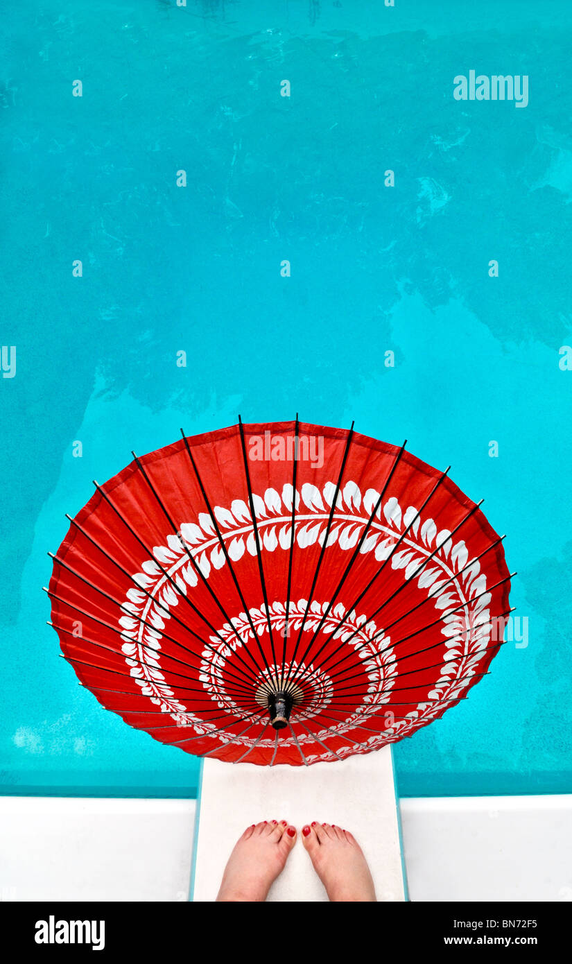 Umbrella parasol feet toes pool hi-res stock photography and images - Alamy