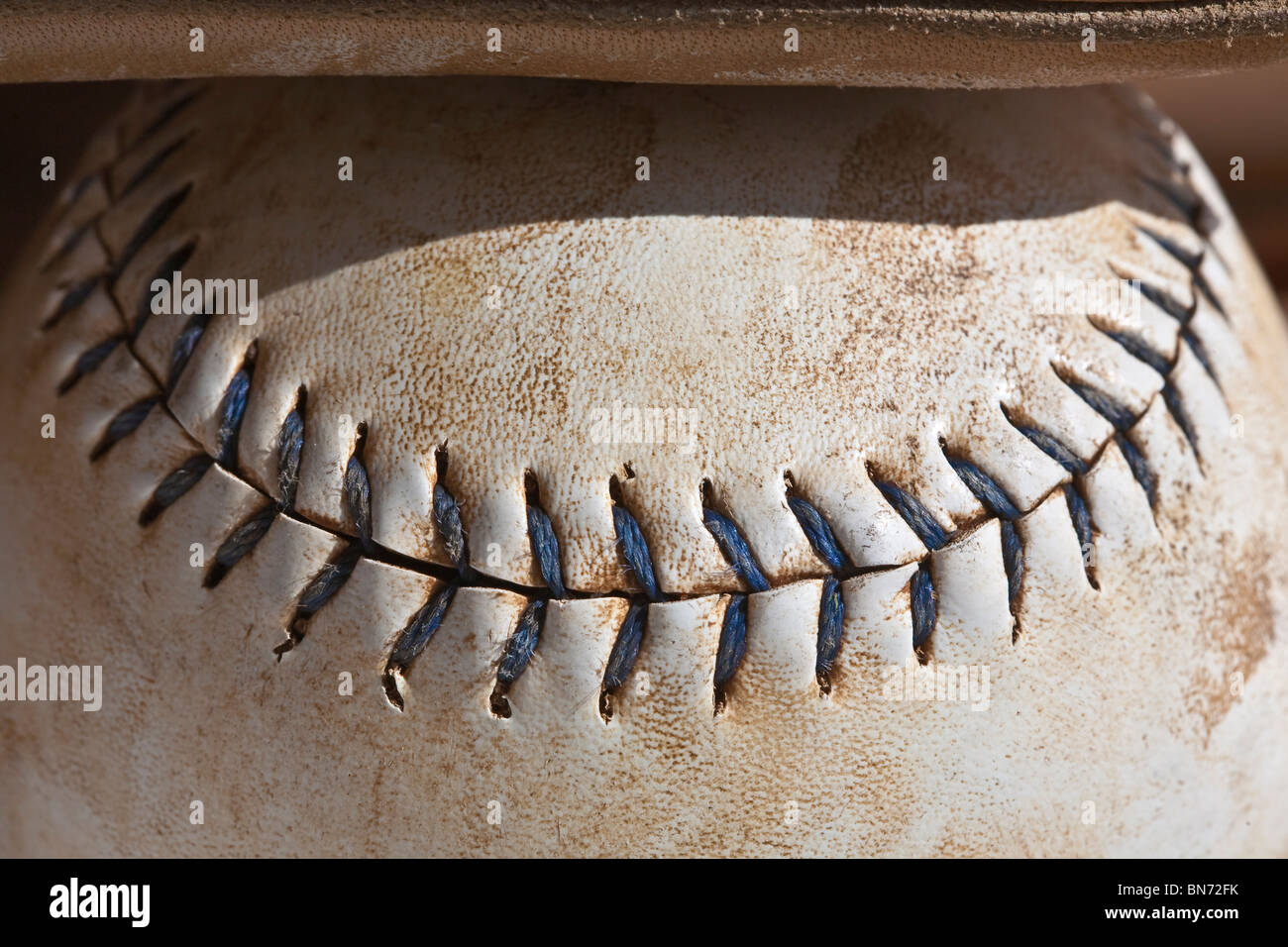 closeup of dirty softball seams and glove Stock Photo - Alamy