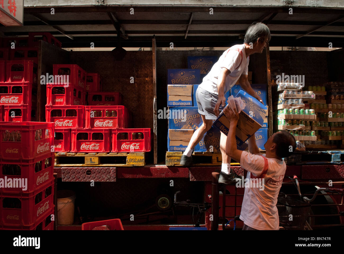 Hong Kong, Coca Cola delivery in the street Stock Photo - Alamy