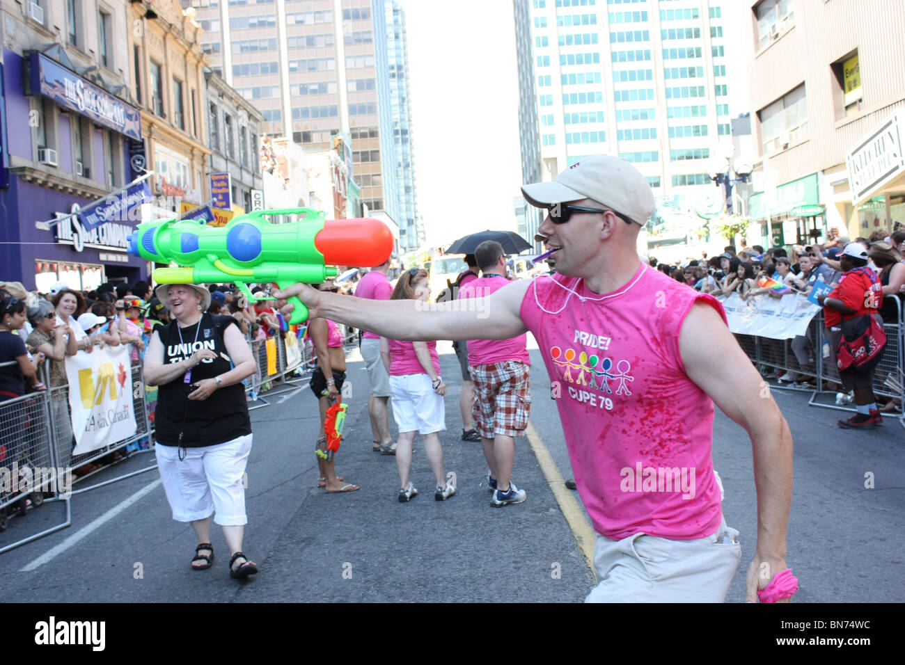 man playing watergun Stock Photo - Alamy