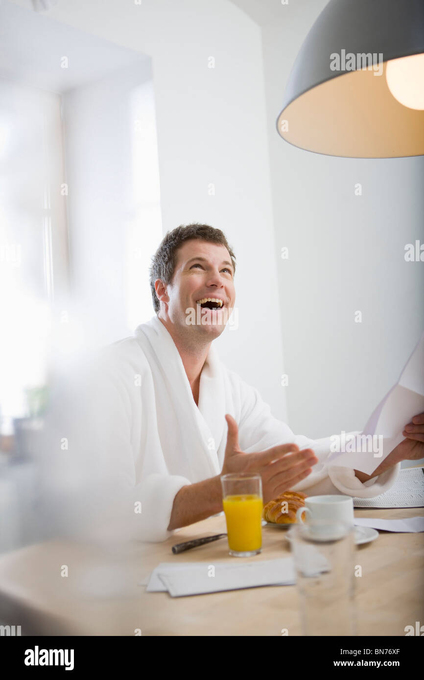 Man getting good news Stock Photo - Alamy