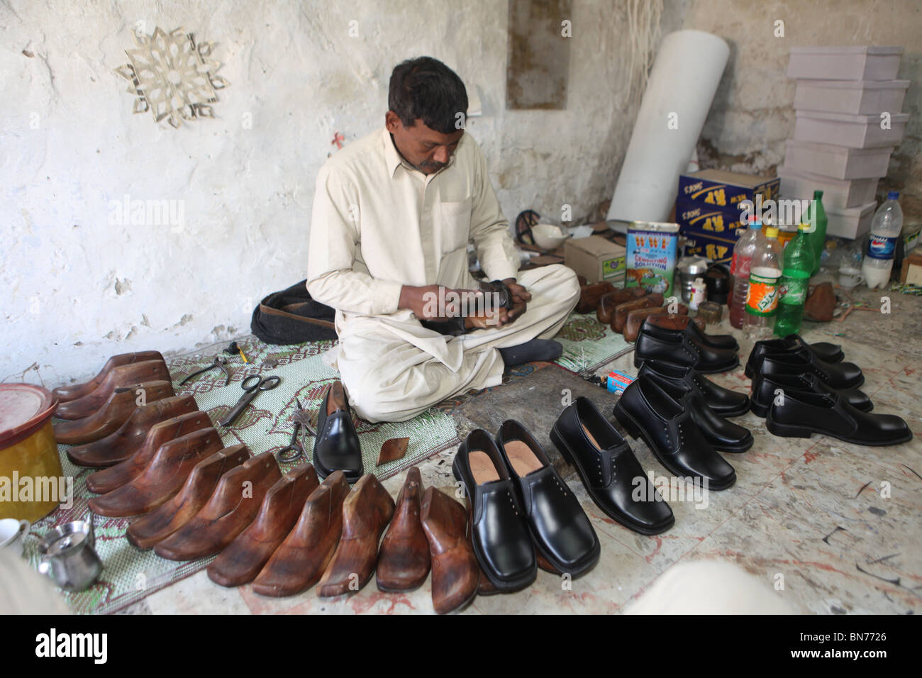 Shoe salesman hi-res stock photography and images - Alamy