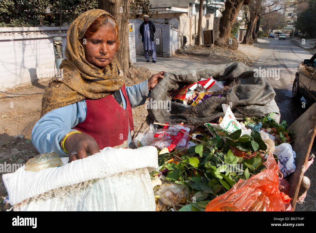 Woman rubbish collector hi-res stock photography and images - Alamy