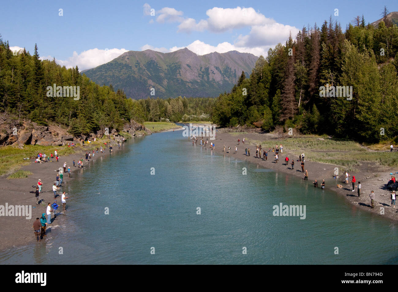 Crowd of combat fisherman fishing for salmon on the banks of Bird Creek ...