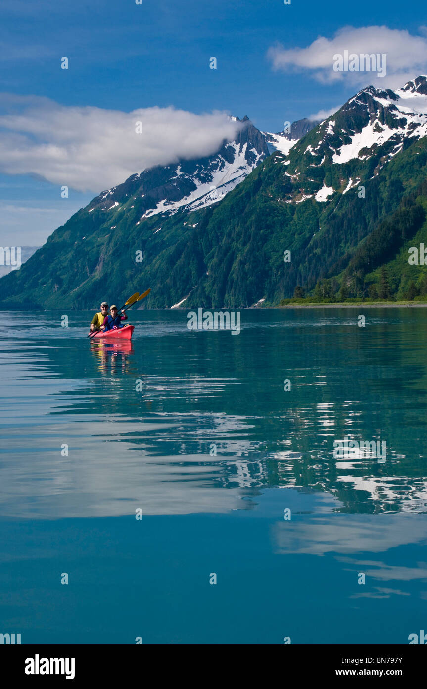 Couple kayaking in Shoup Bay, Prince WIlliam Sound, Alaska Stock Photo ...