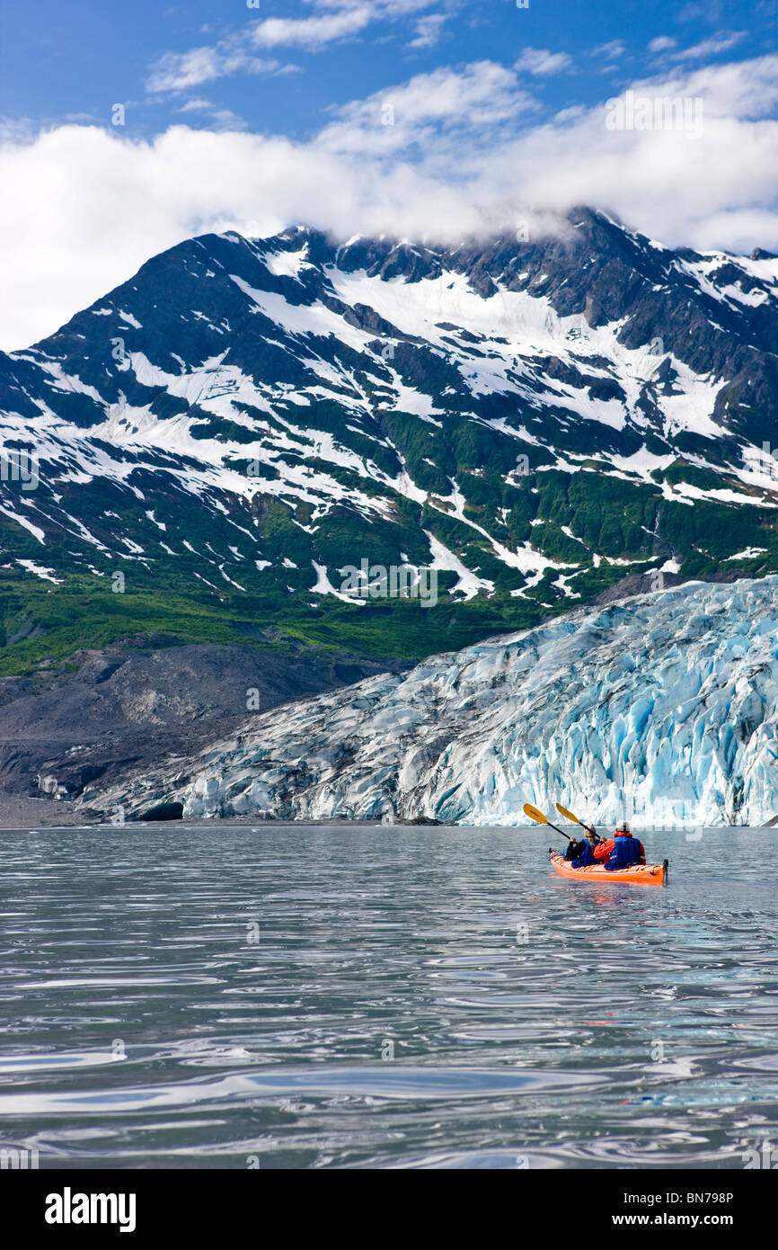 Couple kayaking in Shoup Bay with Shoup Glacier in the background ...
