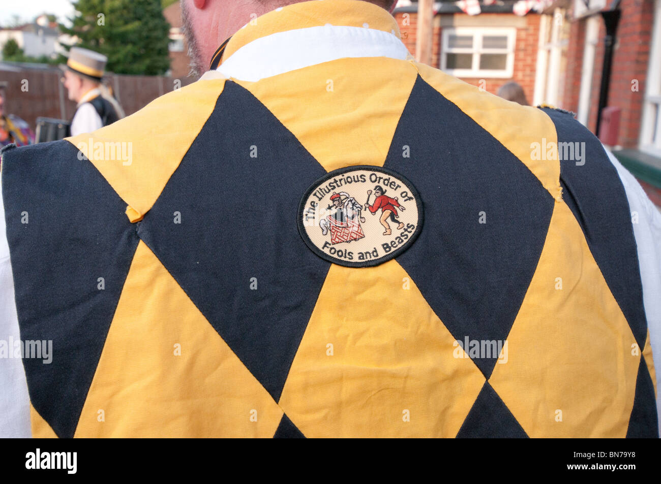 Emblem on rear of costume of Morris dancer performing outside a public ...