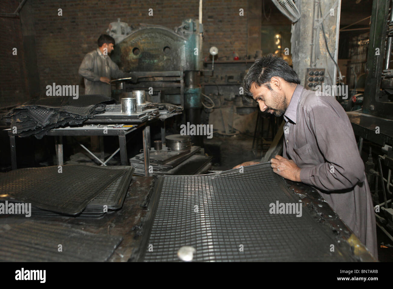 Rubber and pipe factory in islamabad, Pakistan Stock Photo - Alamy