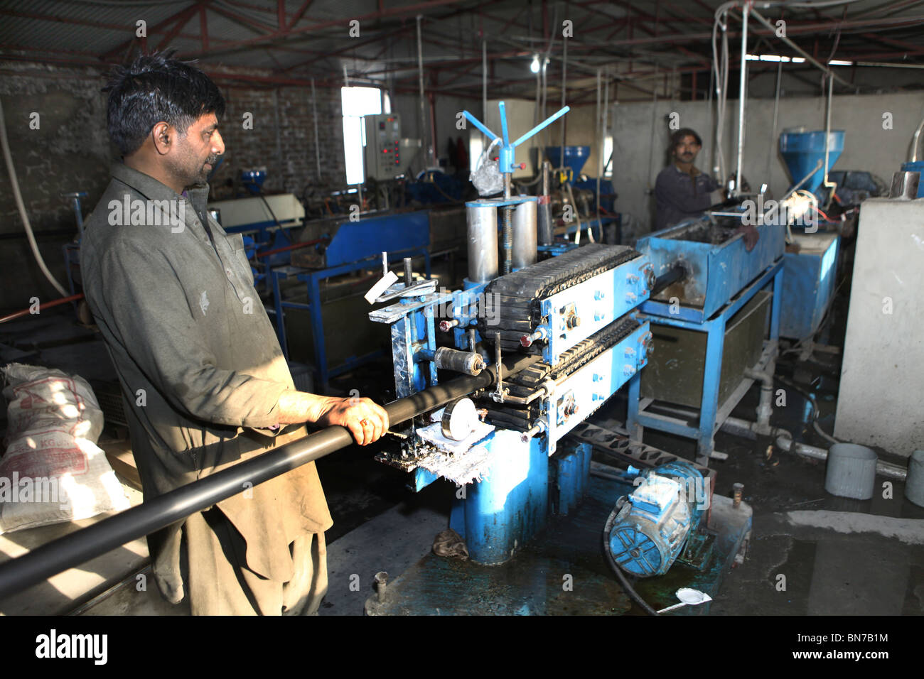 Rubber and pipe factory in islamabad, Pakistan Stock Photo - Alamy