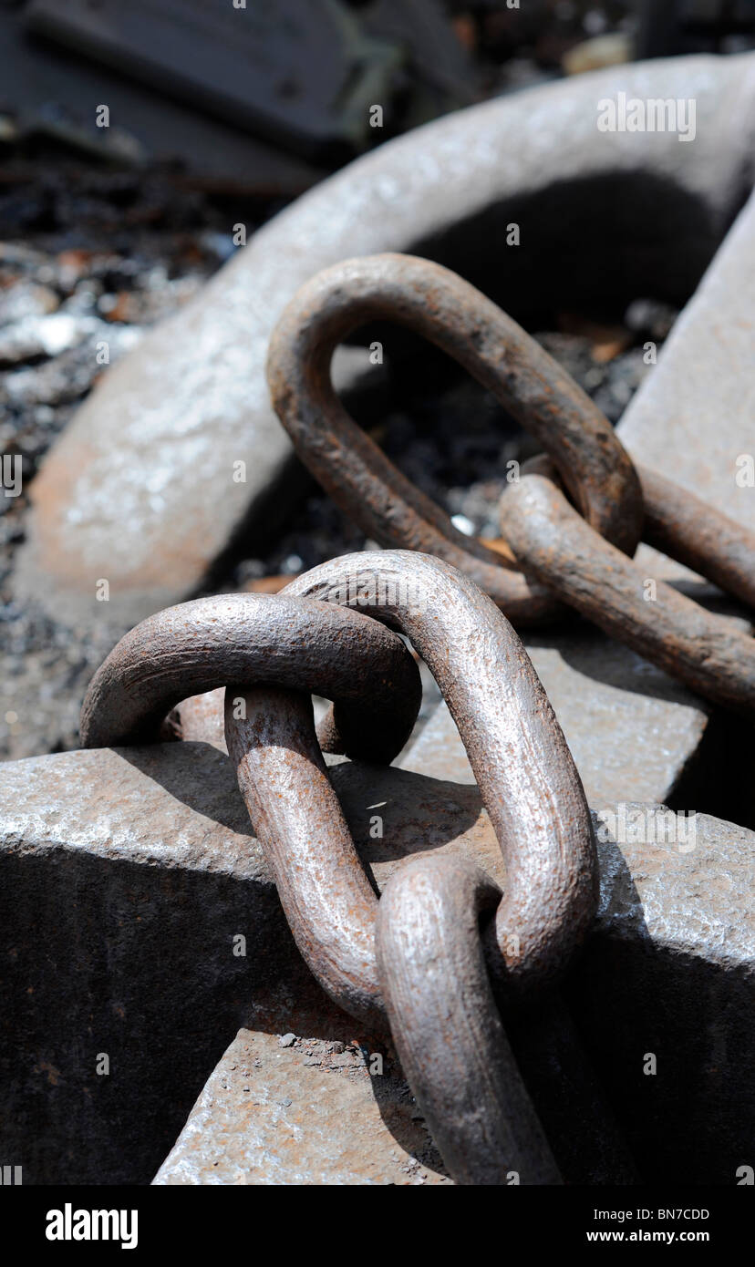 Anchor chain links with part of an anchor Stock Photo - Alamy