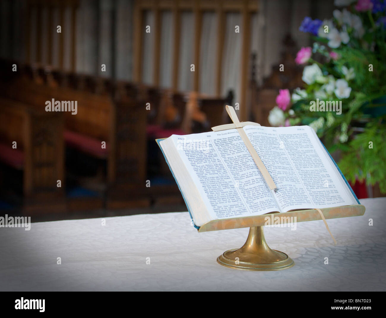 Bible open on altar Stock Photo - Alamy