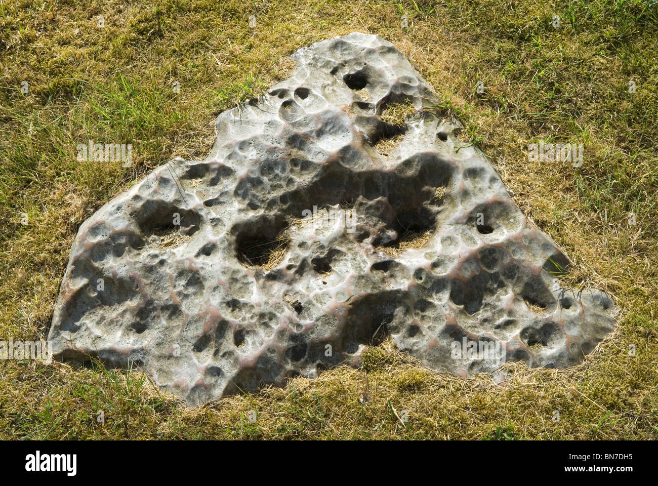 Triangular shaped - by human hand - Sarsen stone outside Wisley Parish ...