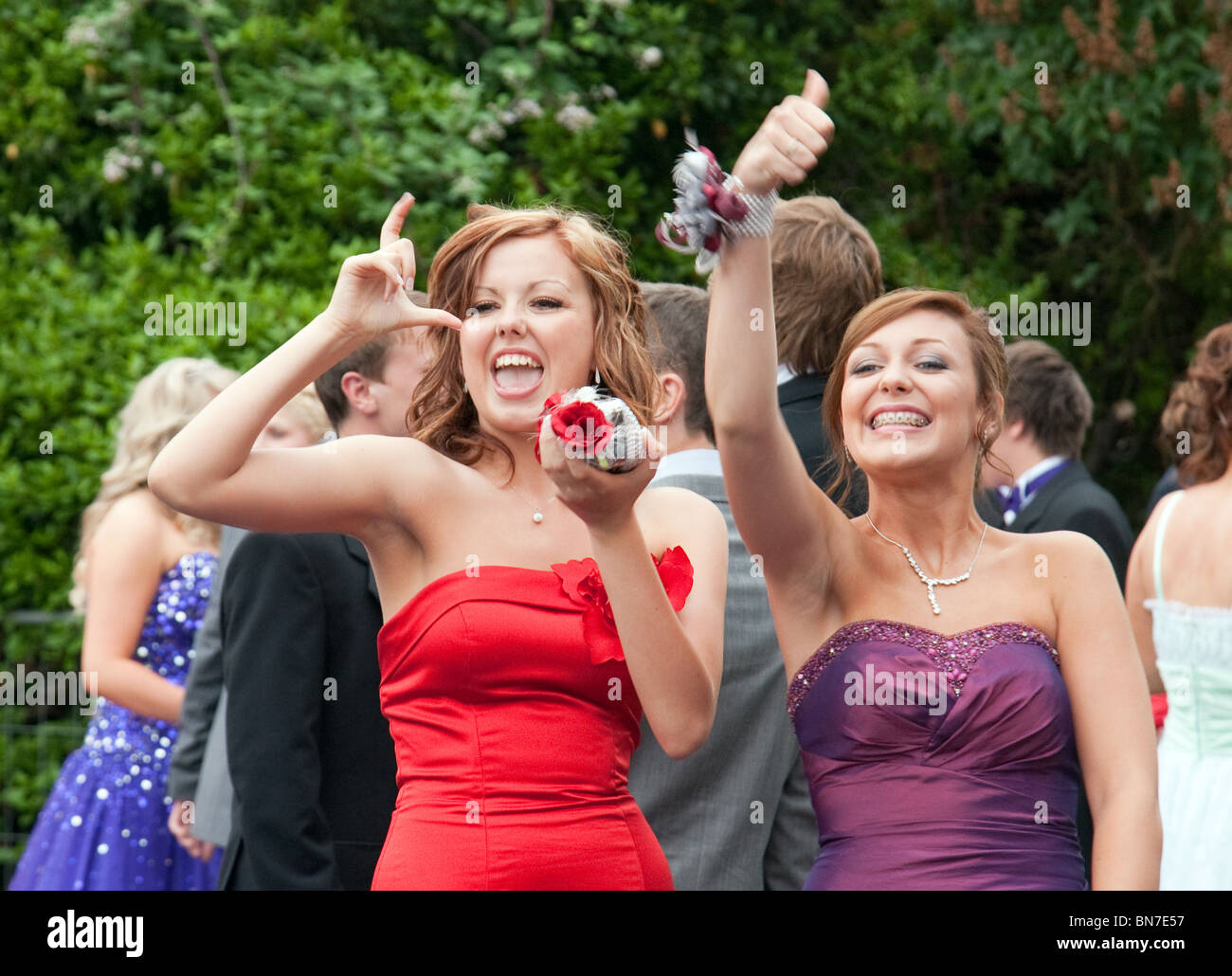 Teenage girls dressed up for their Secondary School Prom, having fun ...