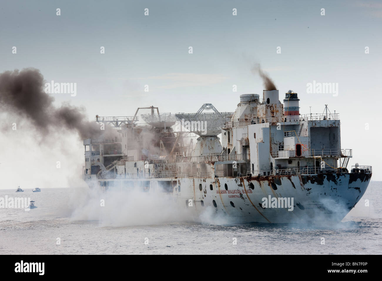 Detonations as the General Hoyt S. Vandenberg ship starts to sink Stock ...