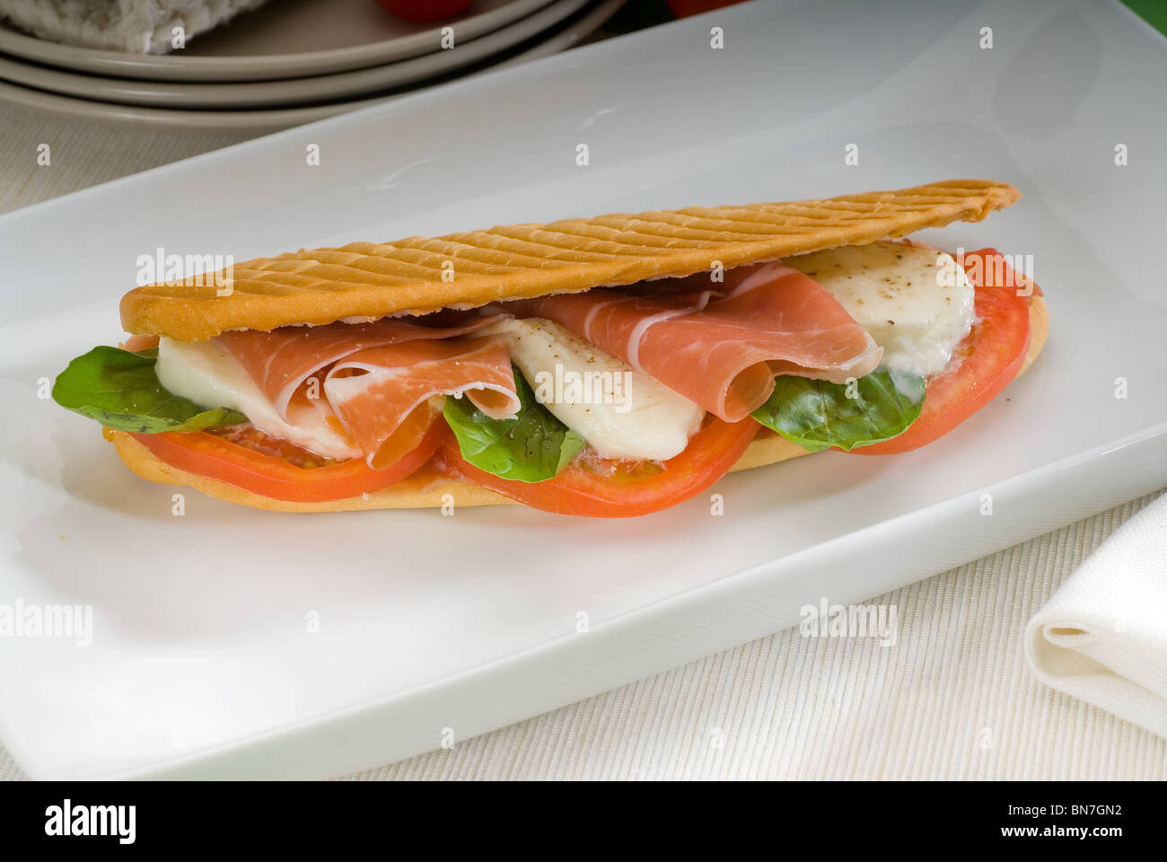 panini sandwich with fresh caprese and parma ham Stock Photo - Alamy
