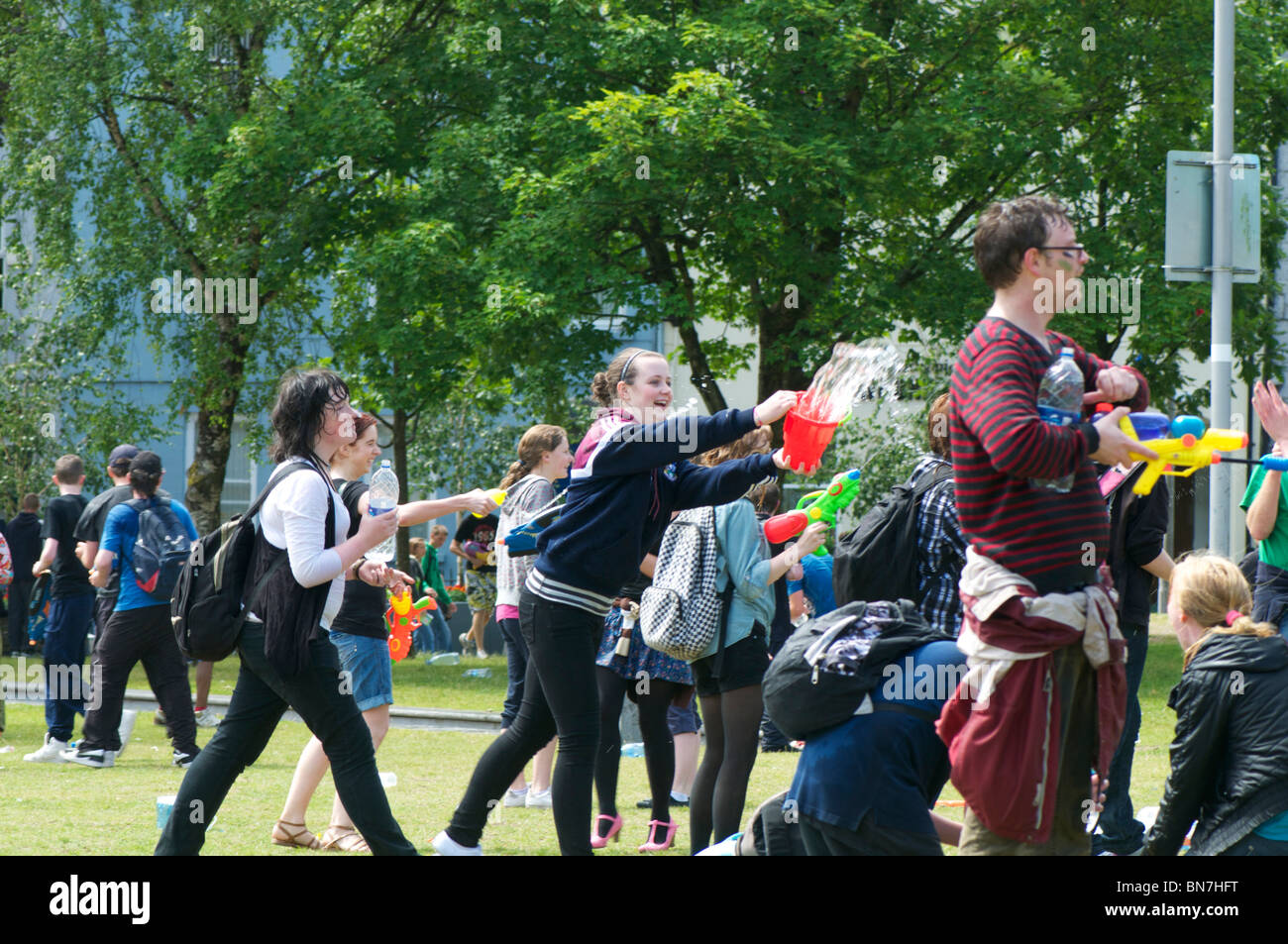 Water fight Galway Stock Photo - Alamy