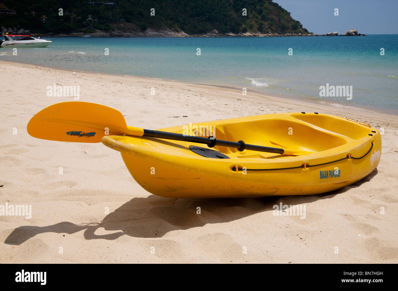 Yellow sea canoe with paddle on a beach in Koh Phangan Thailand Stock ...