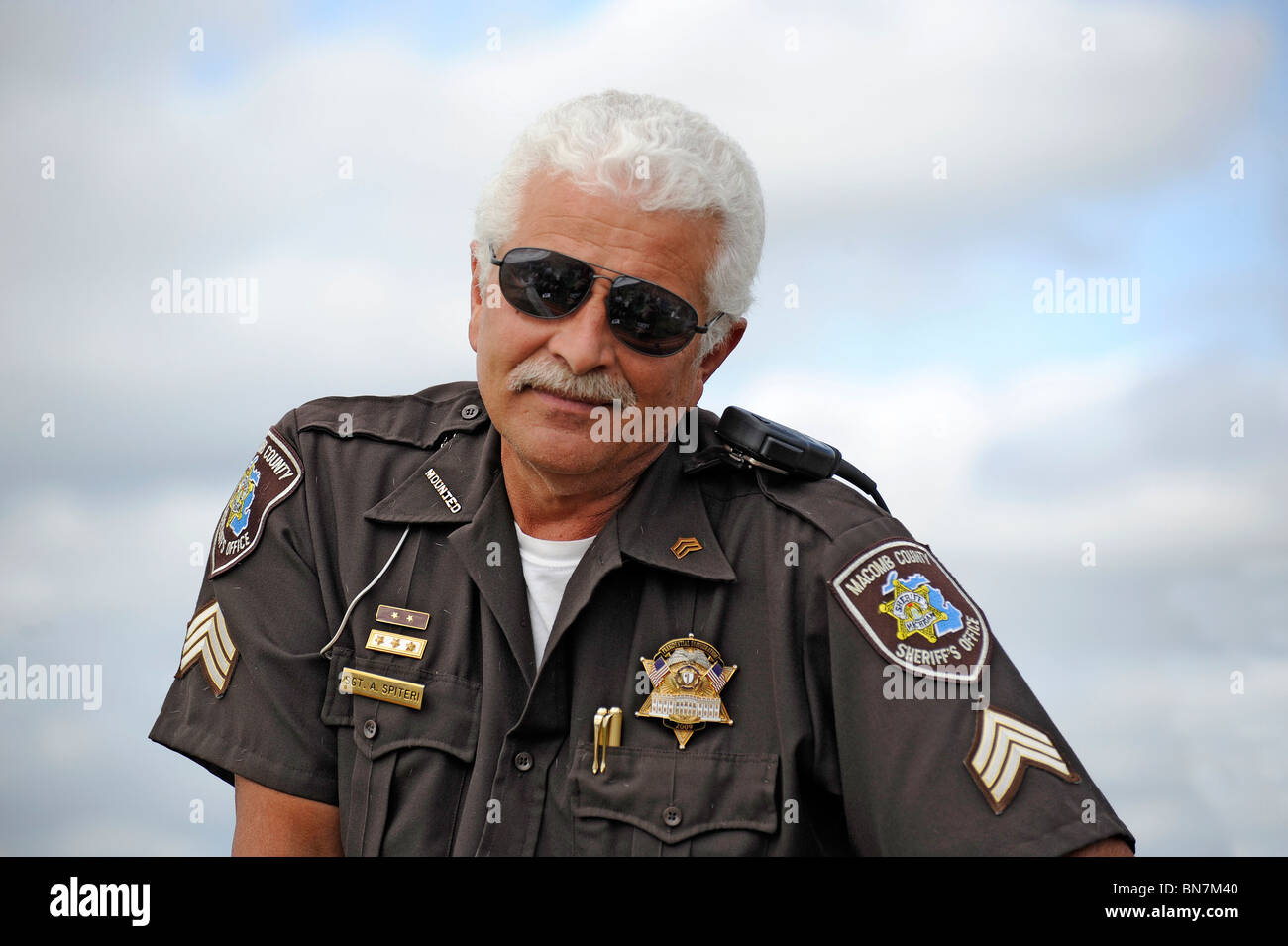 Police on guard for crowd control during a public event Stock Photo - Alamy