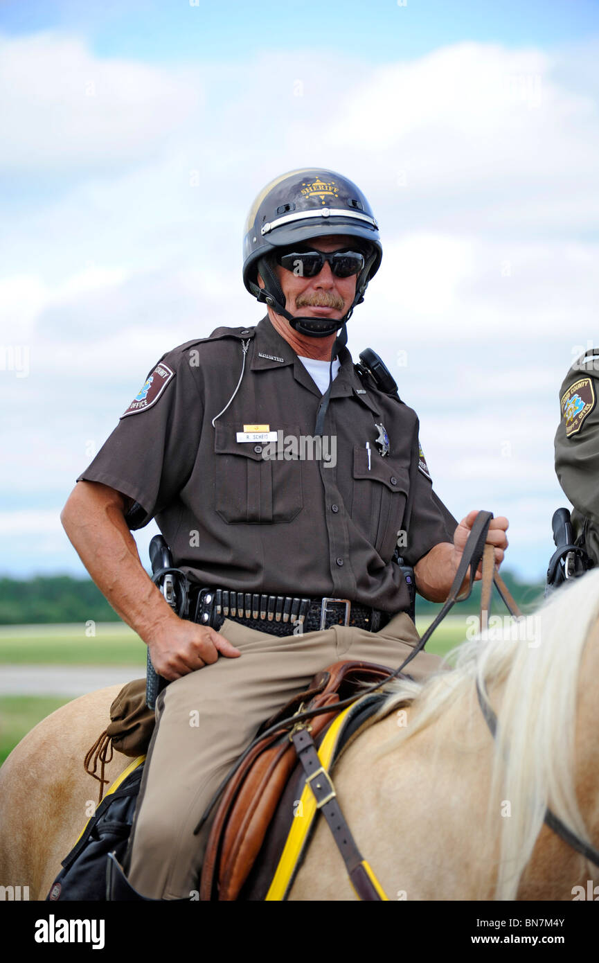 Police on guard for crowd control during a public event Stock Photo - Alamy